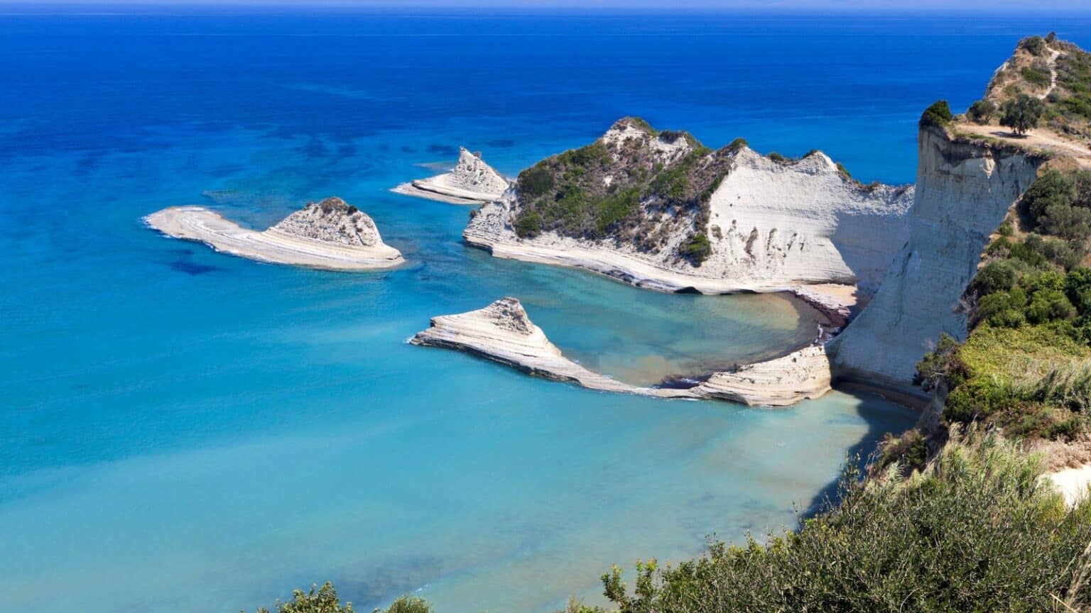 13 Affordable Beach Destinations With Pristine Clear Blue Water